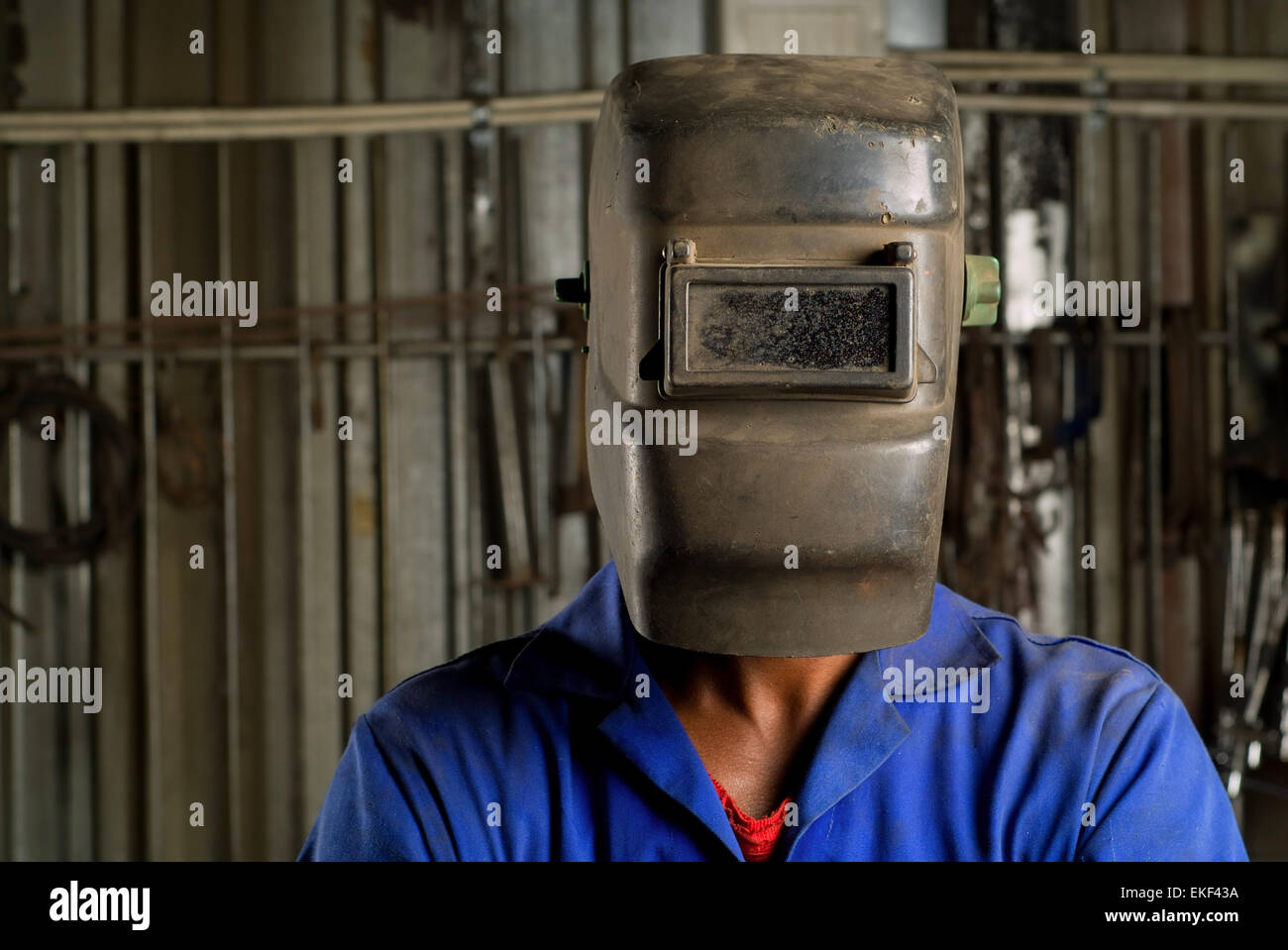 African welder with mask Stock Photo - Alamy