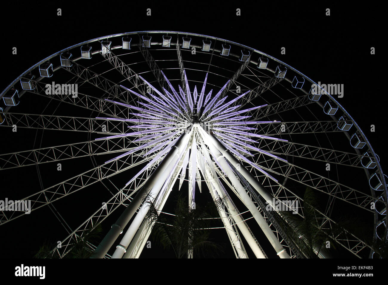 Ferris wheel by night with white light Stock Photo - Alamy