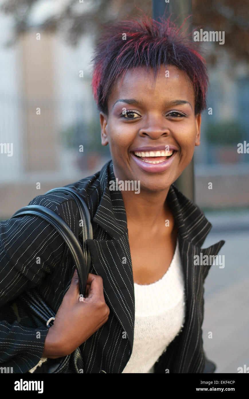 Businesswoman looking left Stock Photo - Alamy