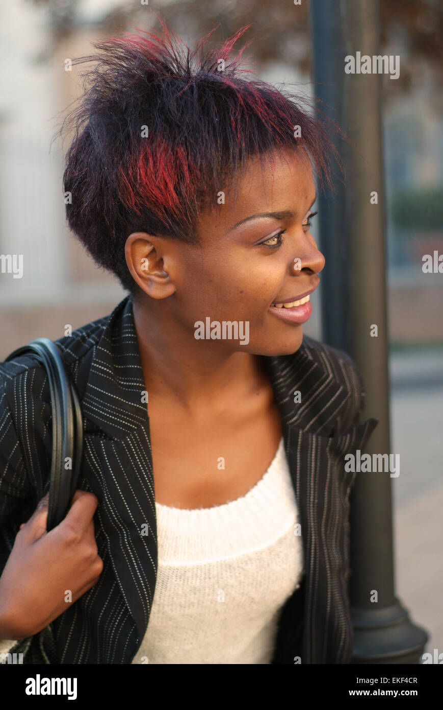 Businesswoman looking left Stock Photo - Alamy