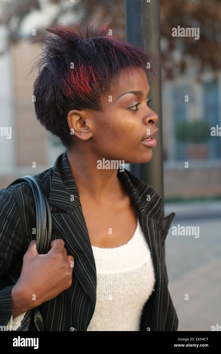 Businesswoman looking left Stock Photo - Alamy