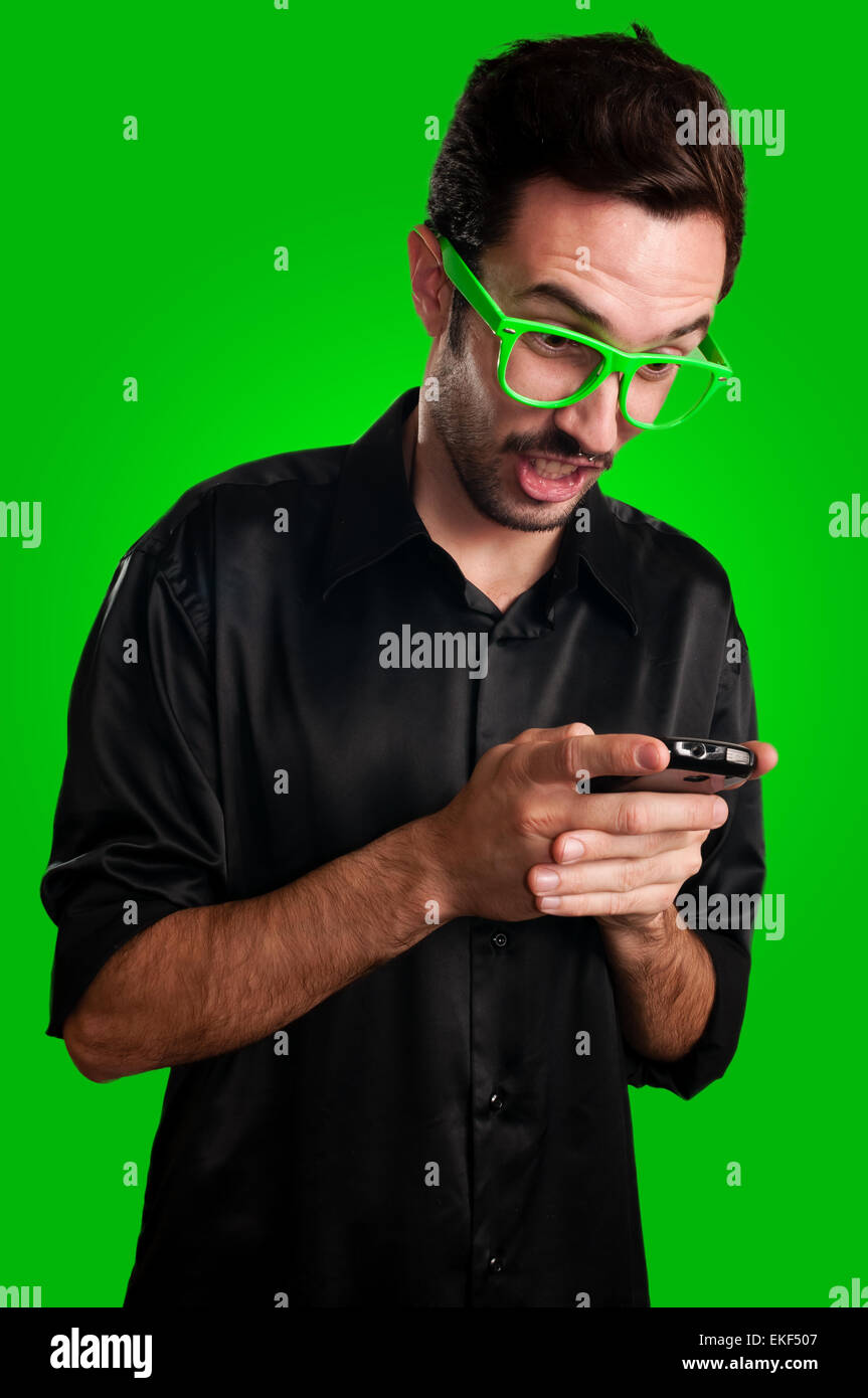 funny man holding phone Stock Photo - Alamy