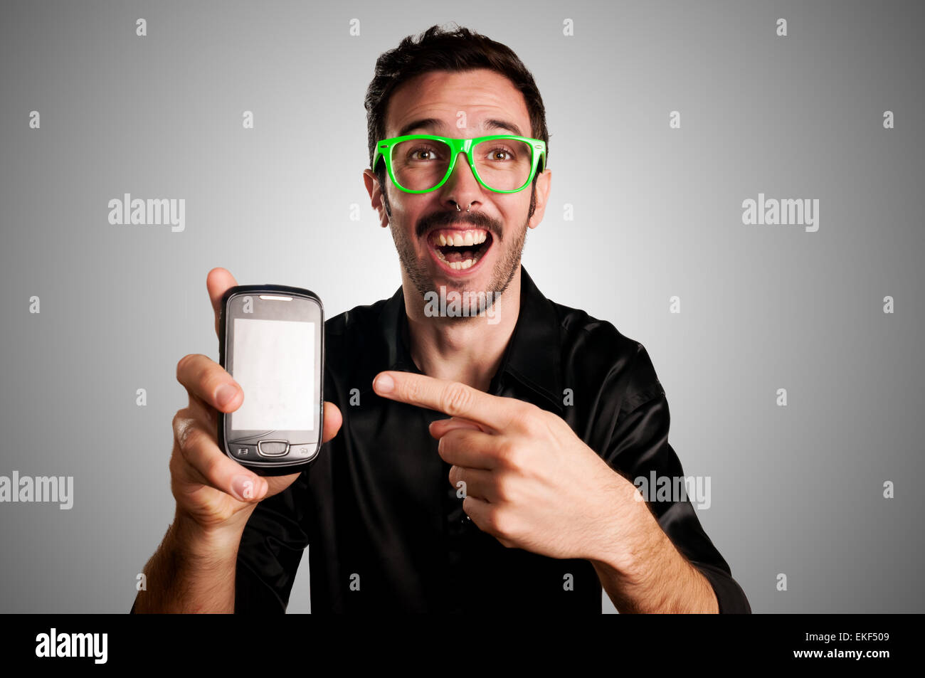 happy man showing phone Stock Photo - Alamy
