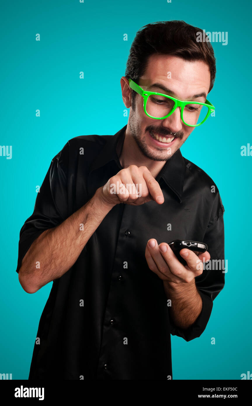 funny man holding phone Stock Photo - Alamy