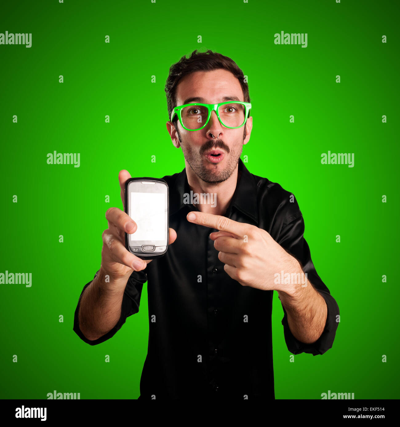 funny man holding phone Stock Photo - Alamy