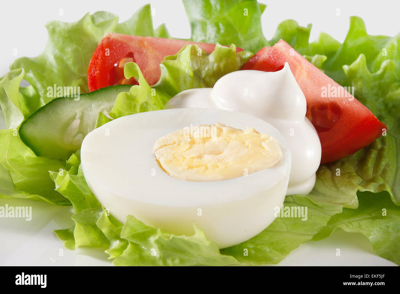 Bolied egg and salad Stock Photo - Alamy
