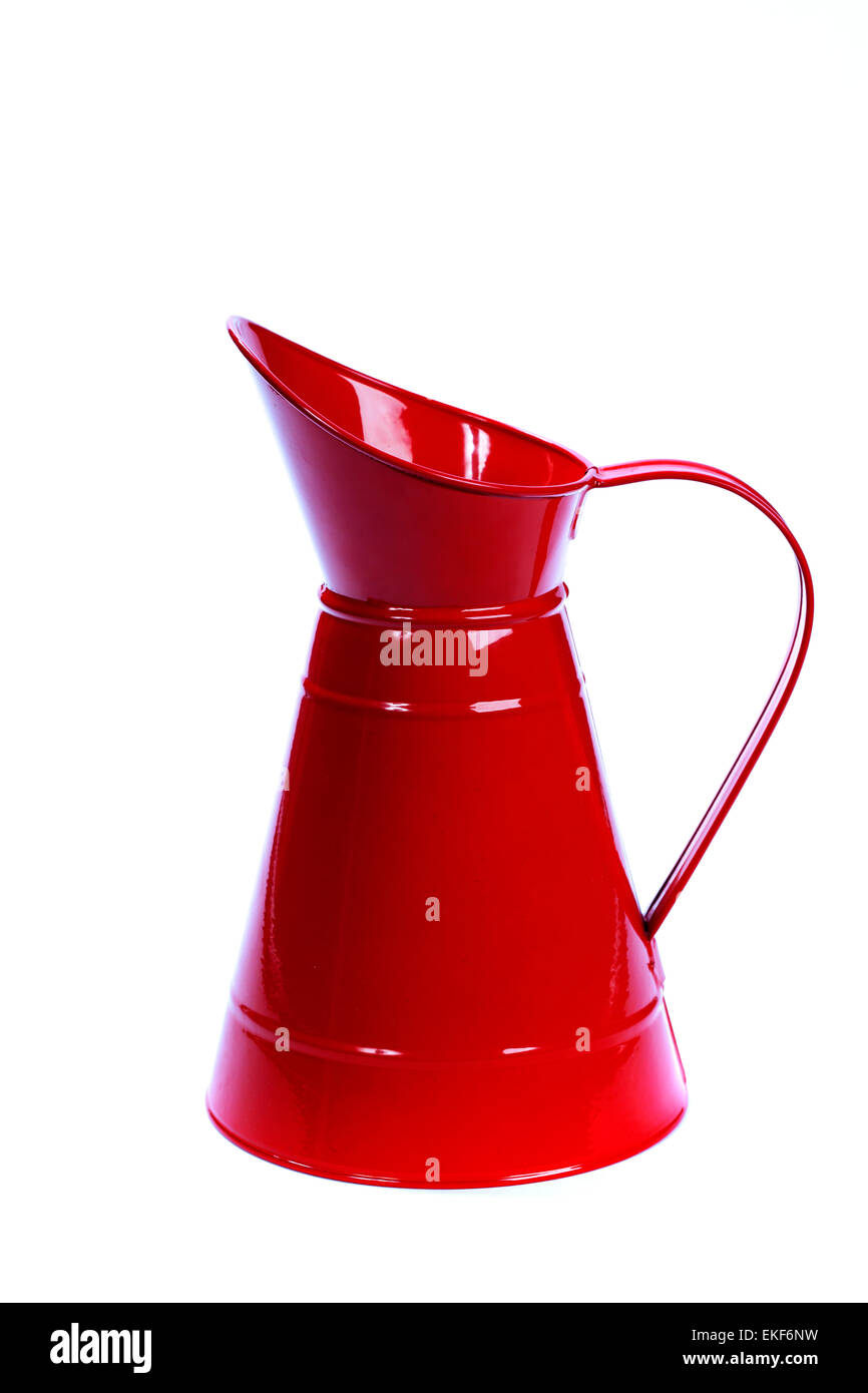 red metal pitcher Stock Photo - Alamy