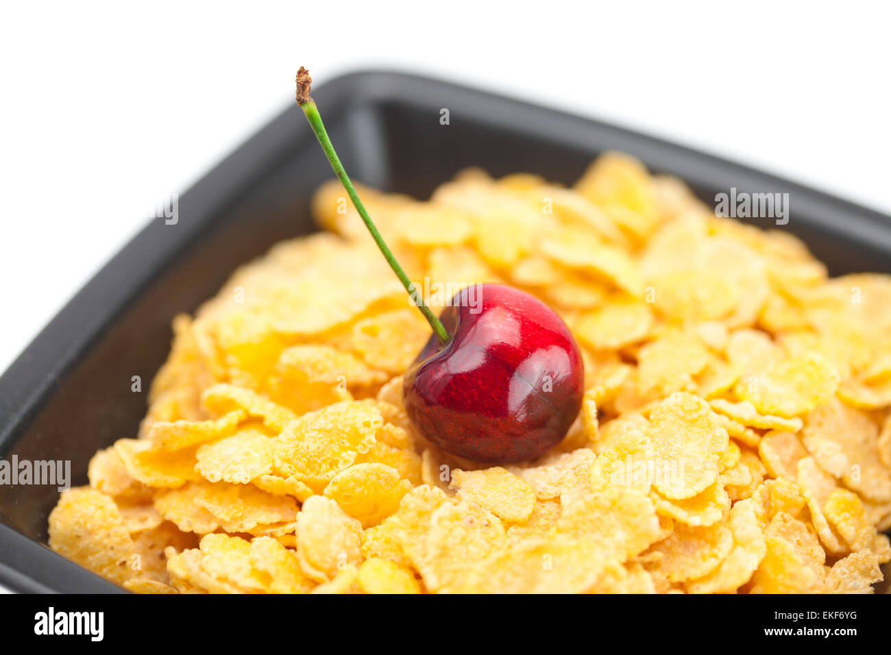 cherry,milk and flakes in a bowl Stock Photo - Alamy