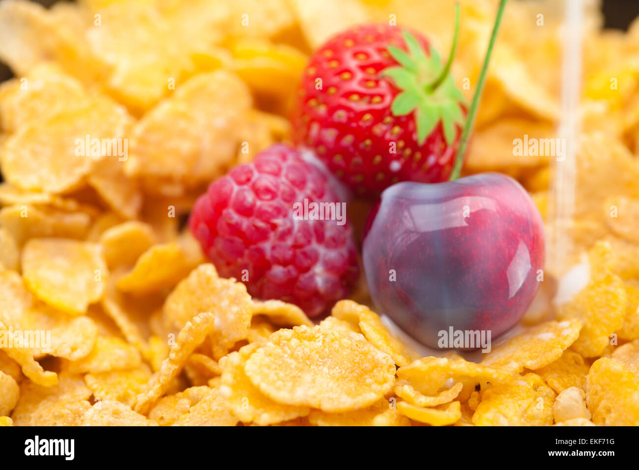 strawberry,raspberry,cherry,milk and flakes in a bowl Stock Photo - Alamy