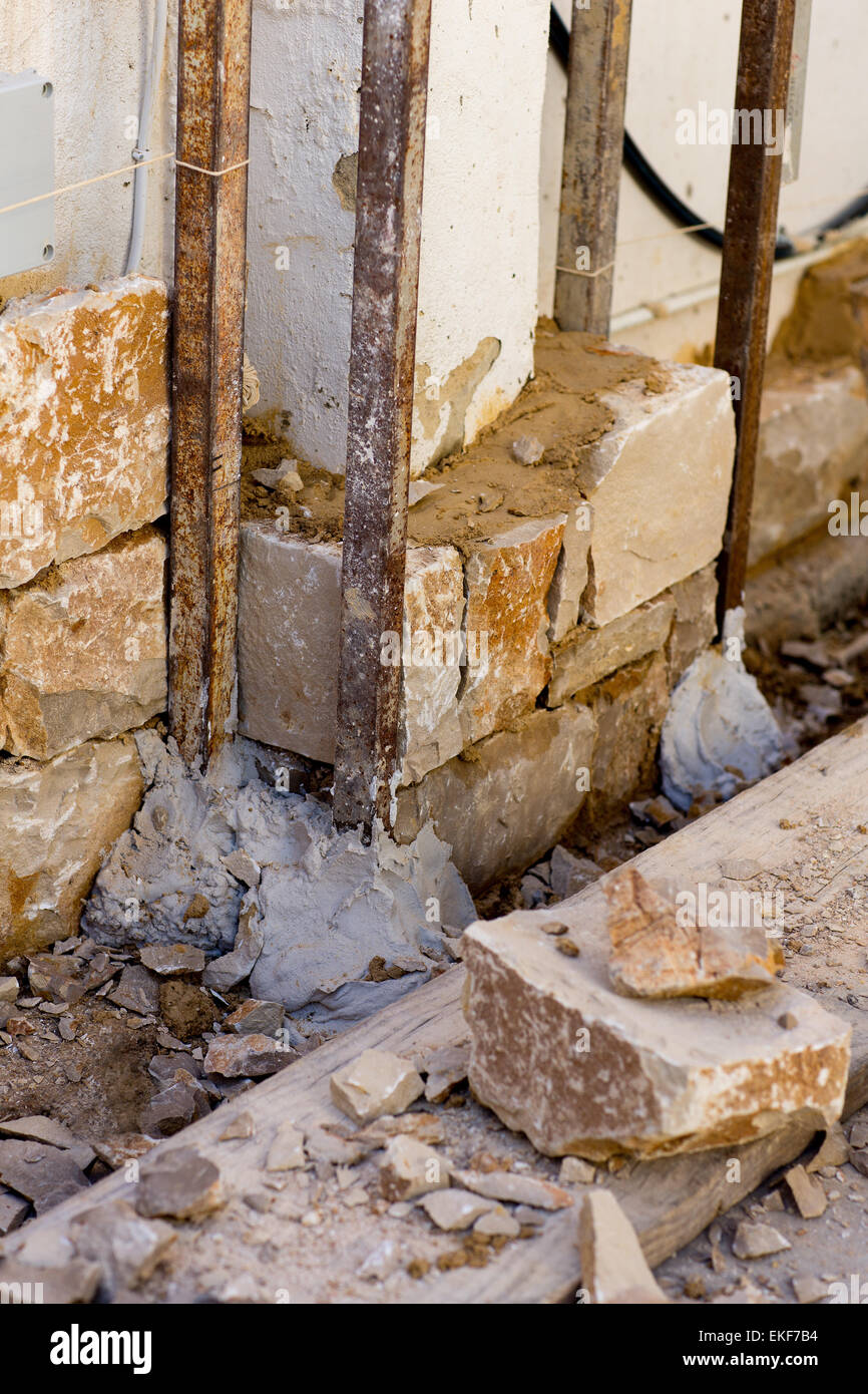 Masonry stone wall construcion process traditional Stock Photo - Alamy