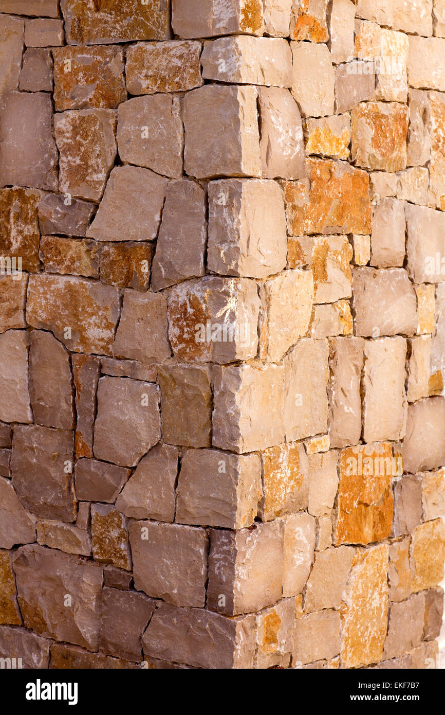 Masonry stone wall corner detail construcion work Stock Photo - Alamy