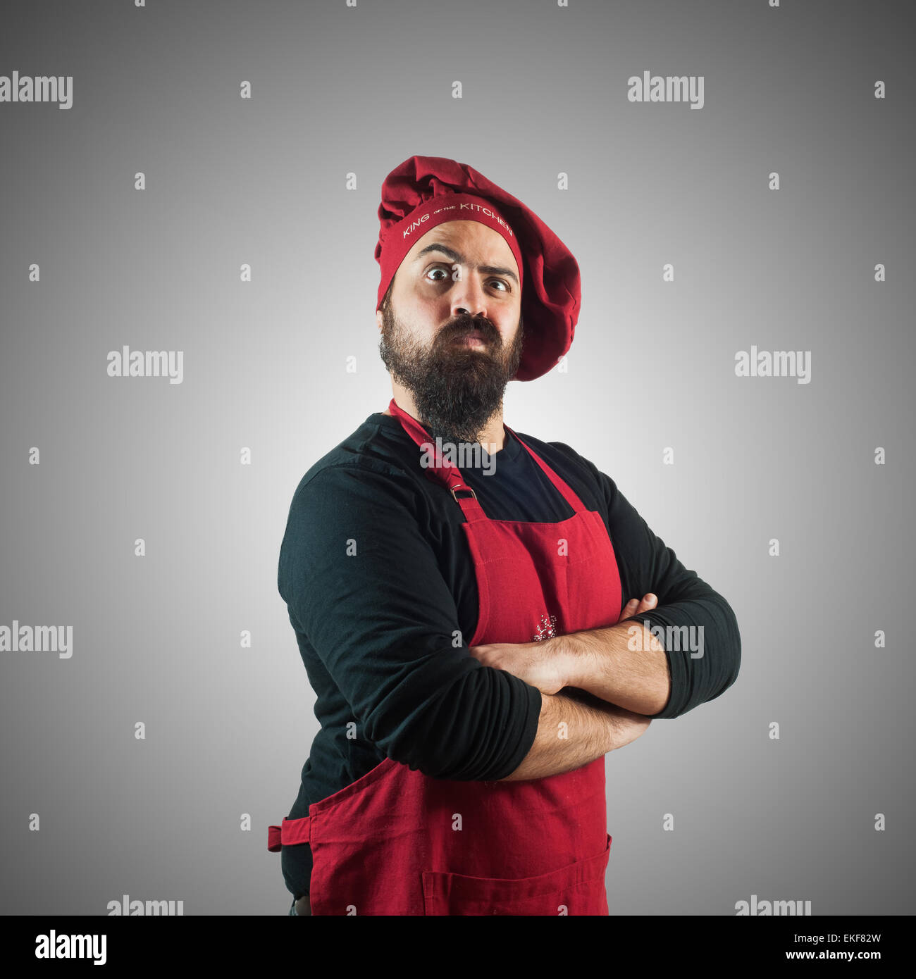 doubtful bearded chubby chef Stock Photo - Alamy