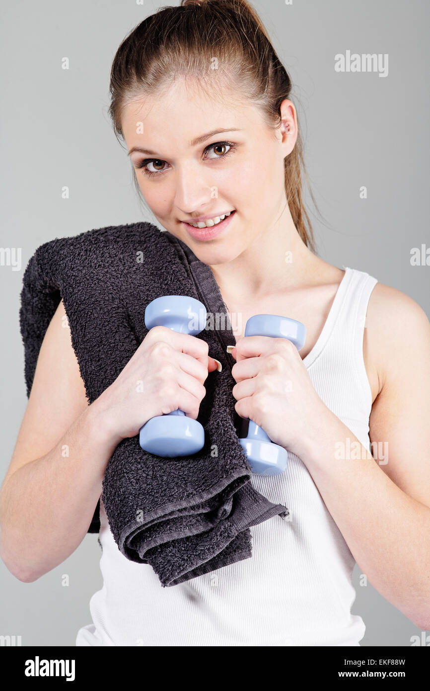 Woman working out with weights Stock Photo - Alamy