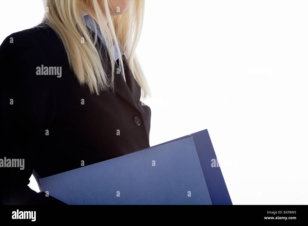 Young professional holding folders Stock Photo - Alamy
