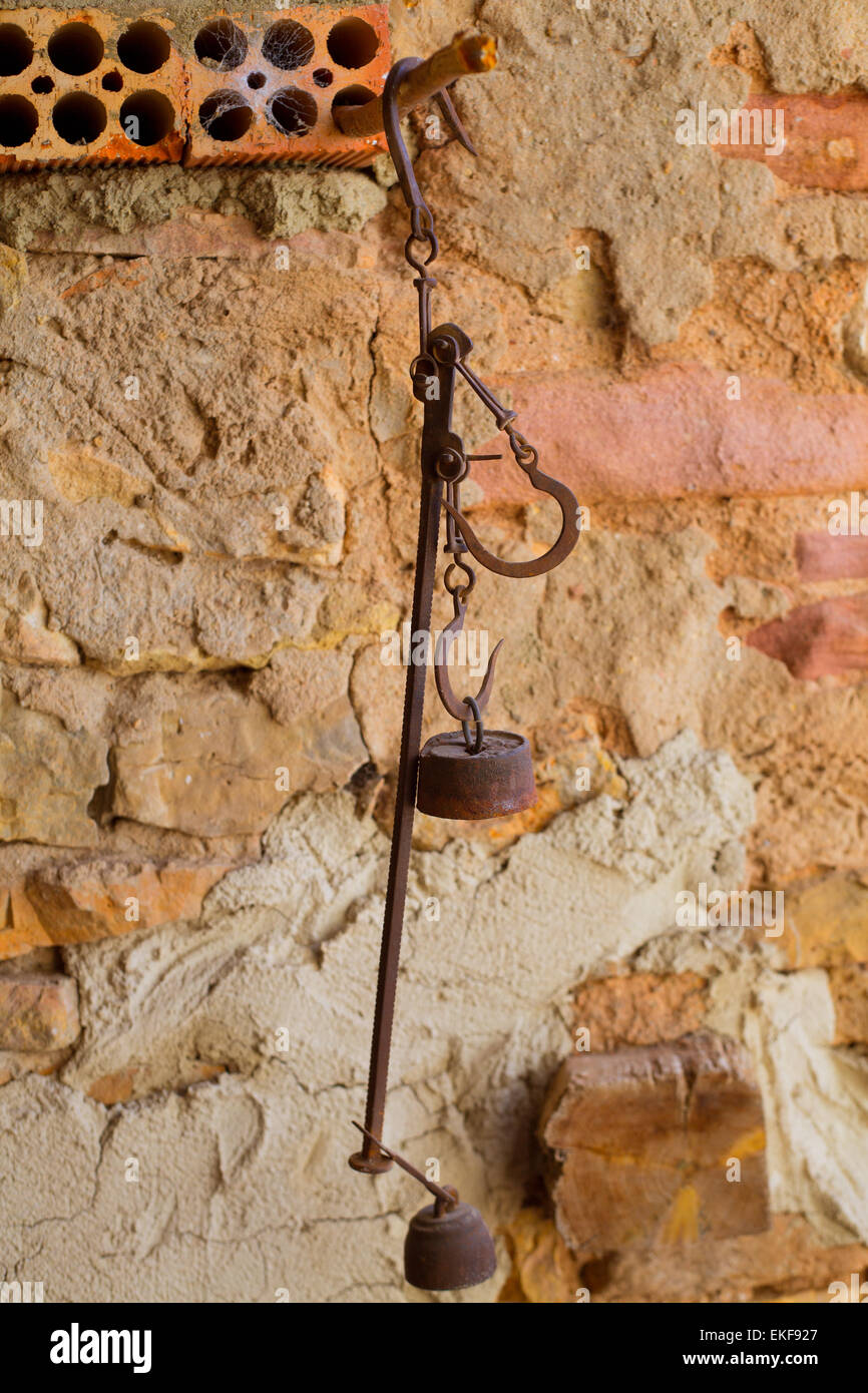 Antique scales rusted iron with weights Stock Photo - Alamy