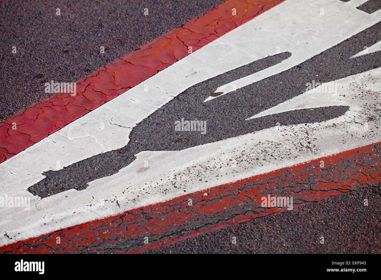 travel signs painted on the road Stock Photo - Alamy