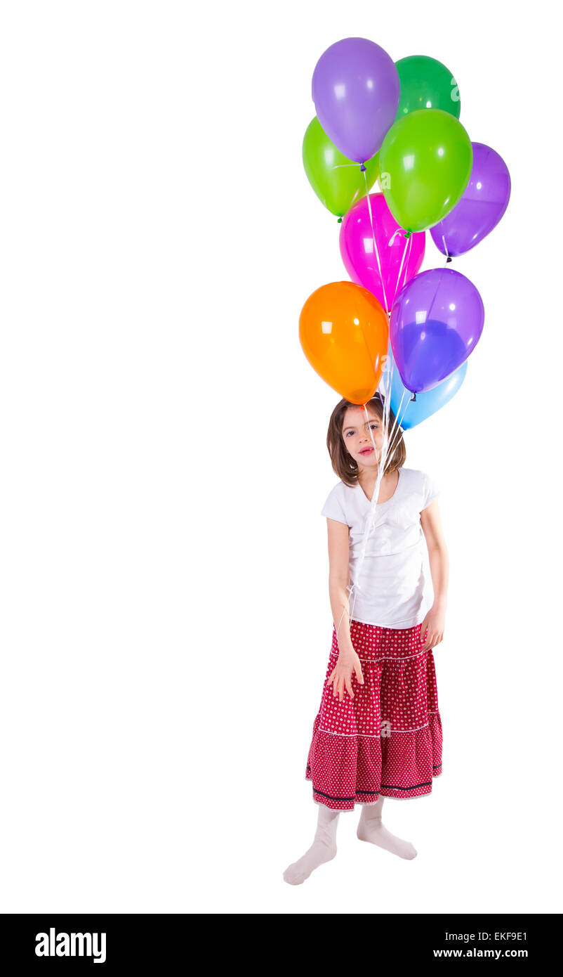 Happy child holding bunch of air balloons over white Stock Photo - Alamy