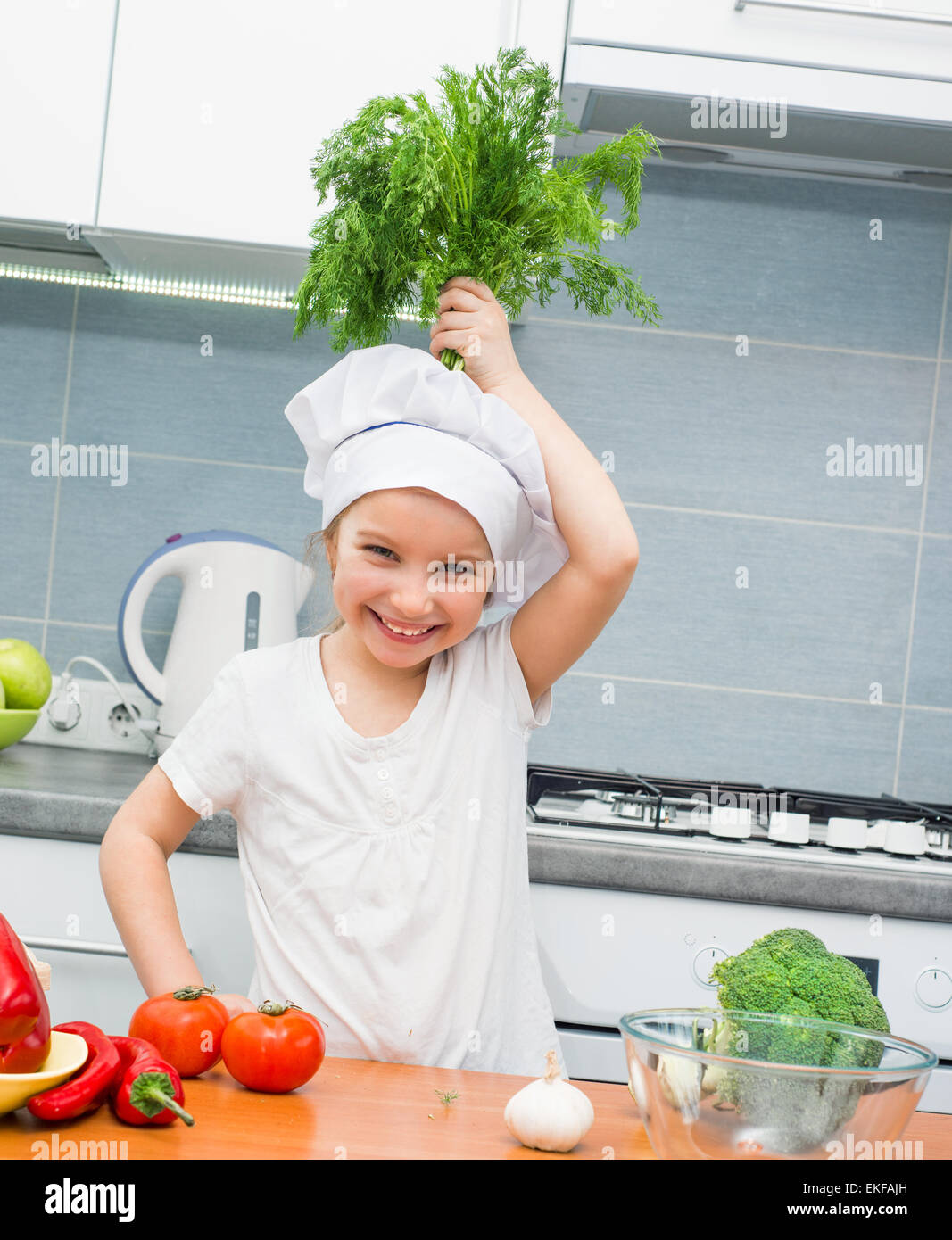 little girl in kitchen Stock Photo - Alamy
