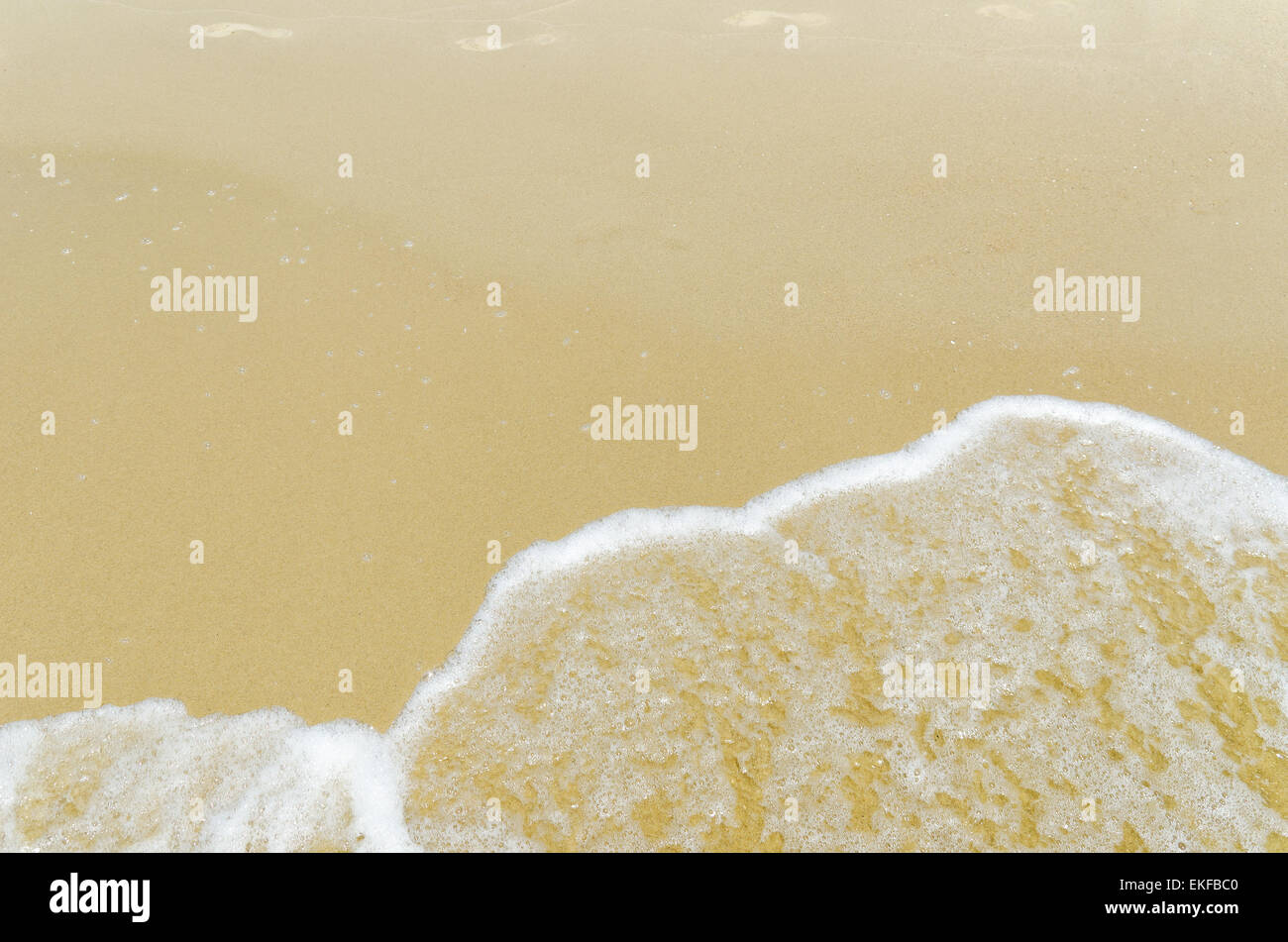 sand with white foam Stock Photo - Alamy