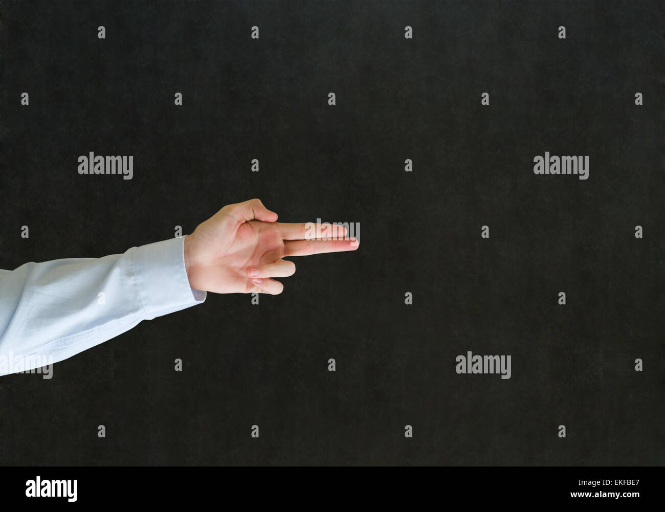 Man pointing fingers like a gun Stock Photo - Alamy