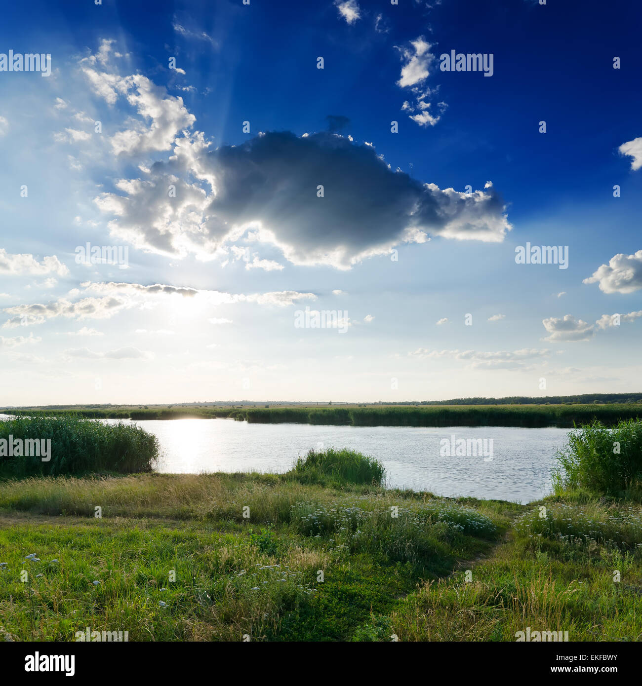 dramatic sky over river Stock Photo - Alamy