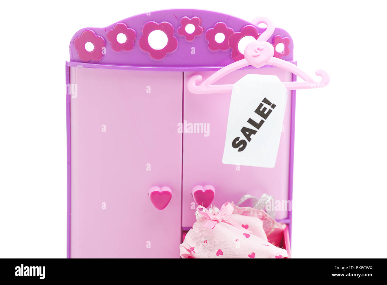 hanger with a price tag sale and doll wardrobe isolated on white Stock ...