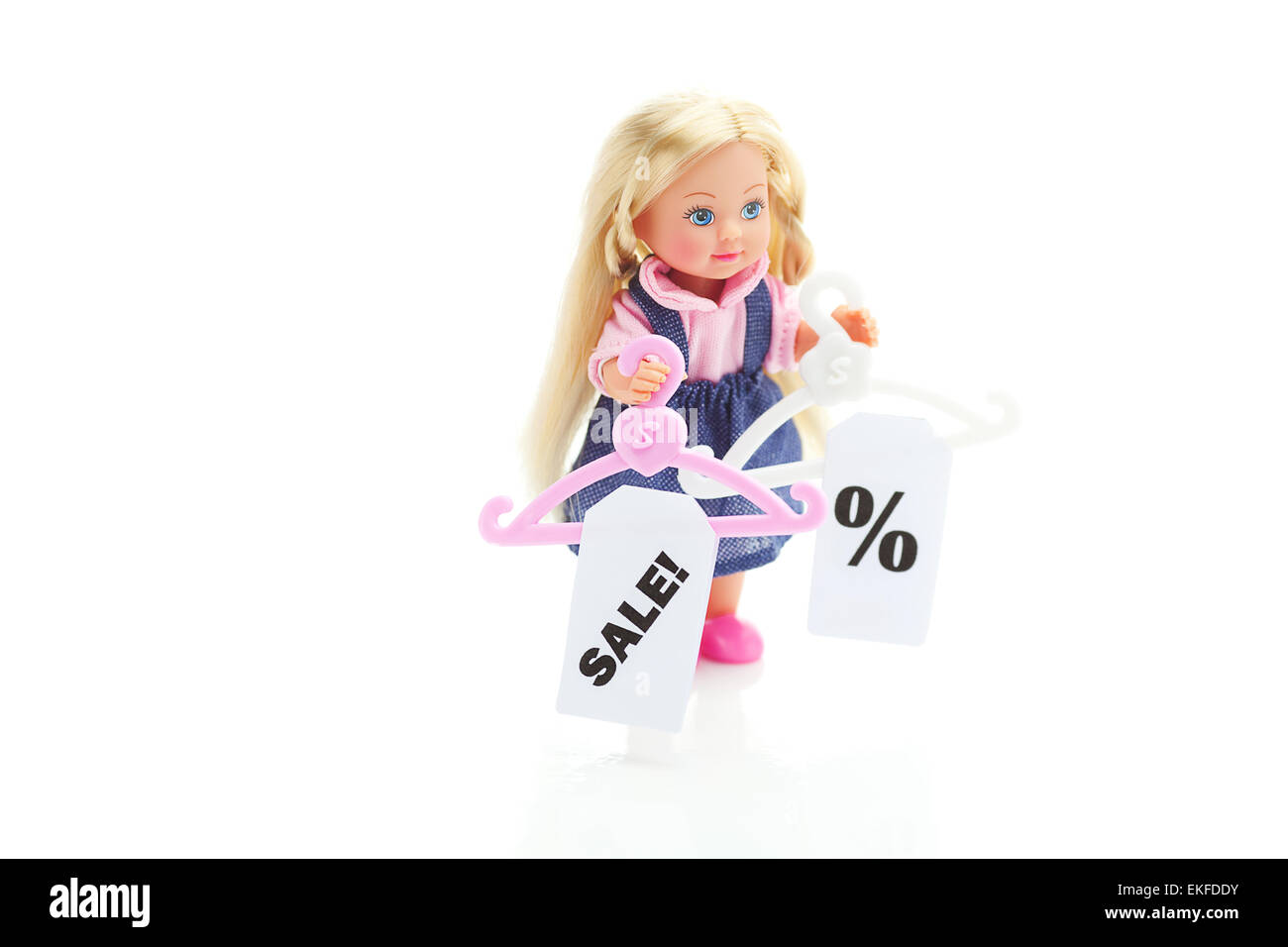 doll and hanger with a price tag sale isolated on white Stock Photo - Alamy