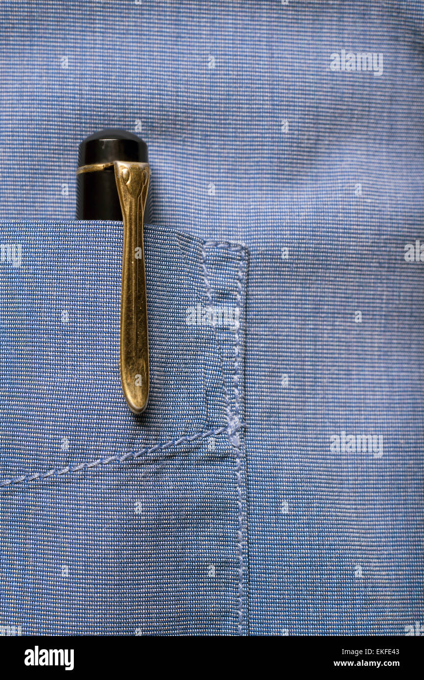 Closeup of fountain pen in the pocket of a blue shirt Stock Photo - Alamy