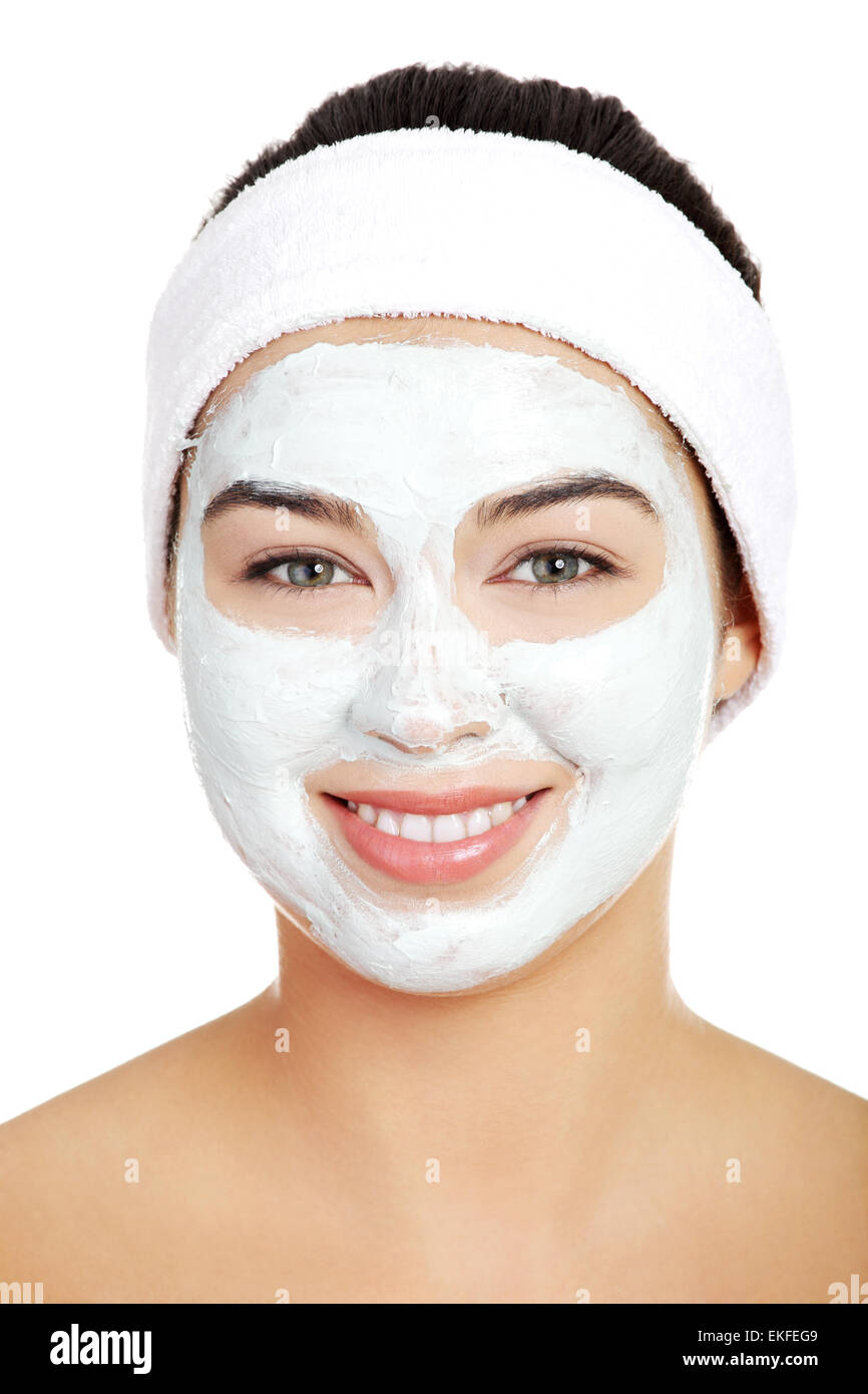 Beautiful woman with clay facial mask Stock Photo - Alamy