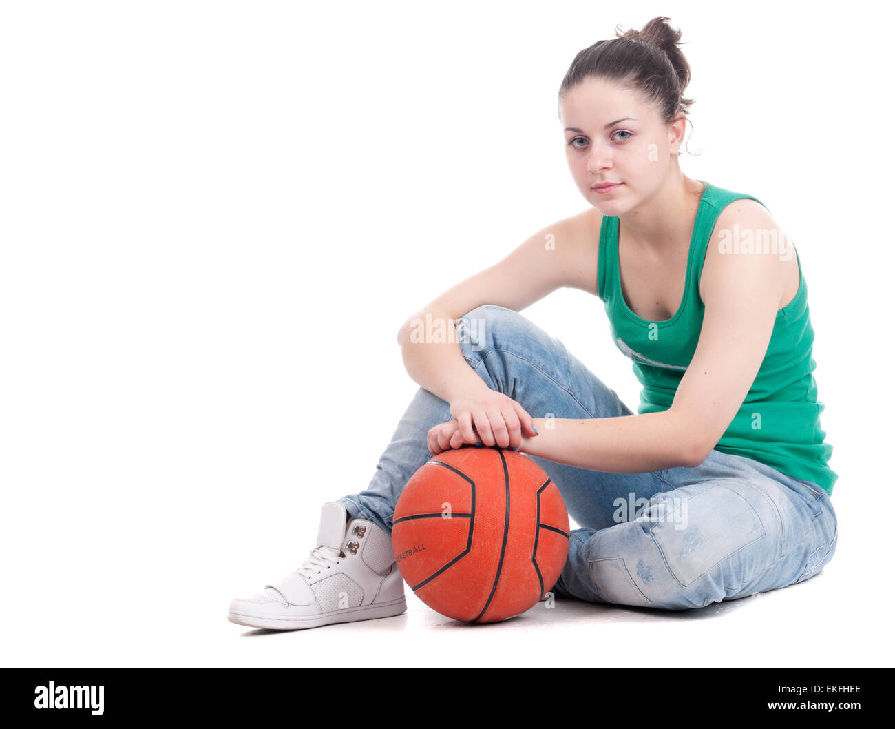 Beautiful young basketball woman in studio Stock Photo - Alamy
