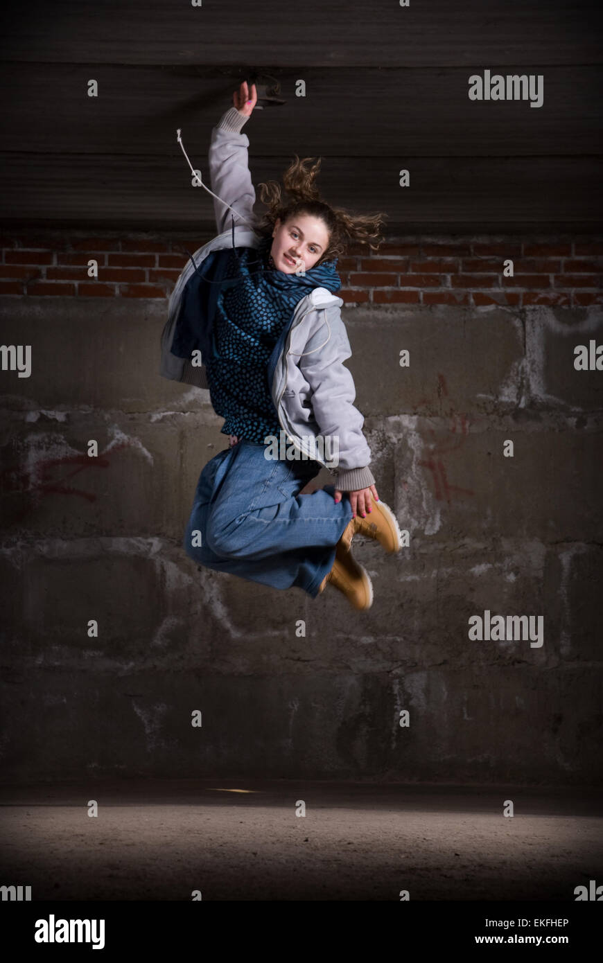 Hip hop dancer in modern style over brick wall Stock Photo - Alamy