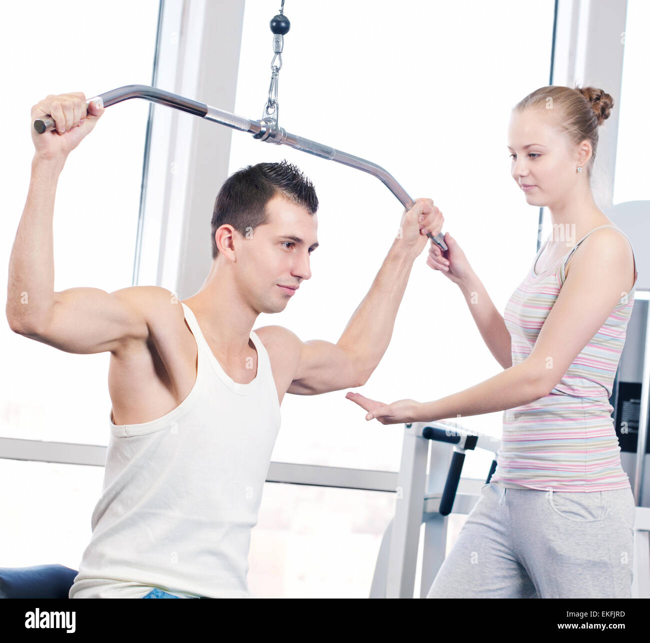 Gym man and woman doing exercise Stock Photo - Alamy