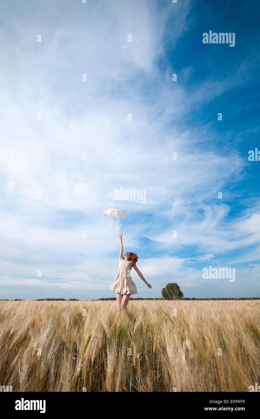 Lady fly umbrella hi-res stock photography and images - Alamy