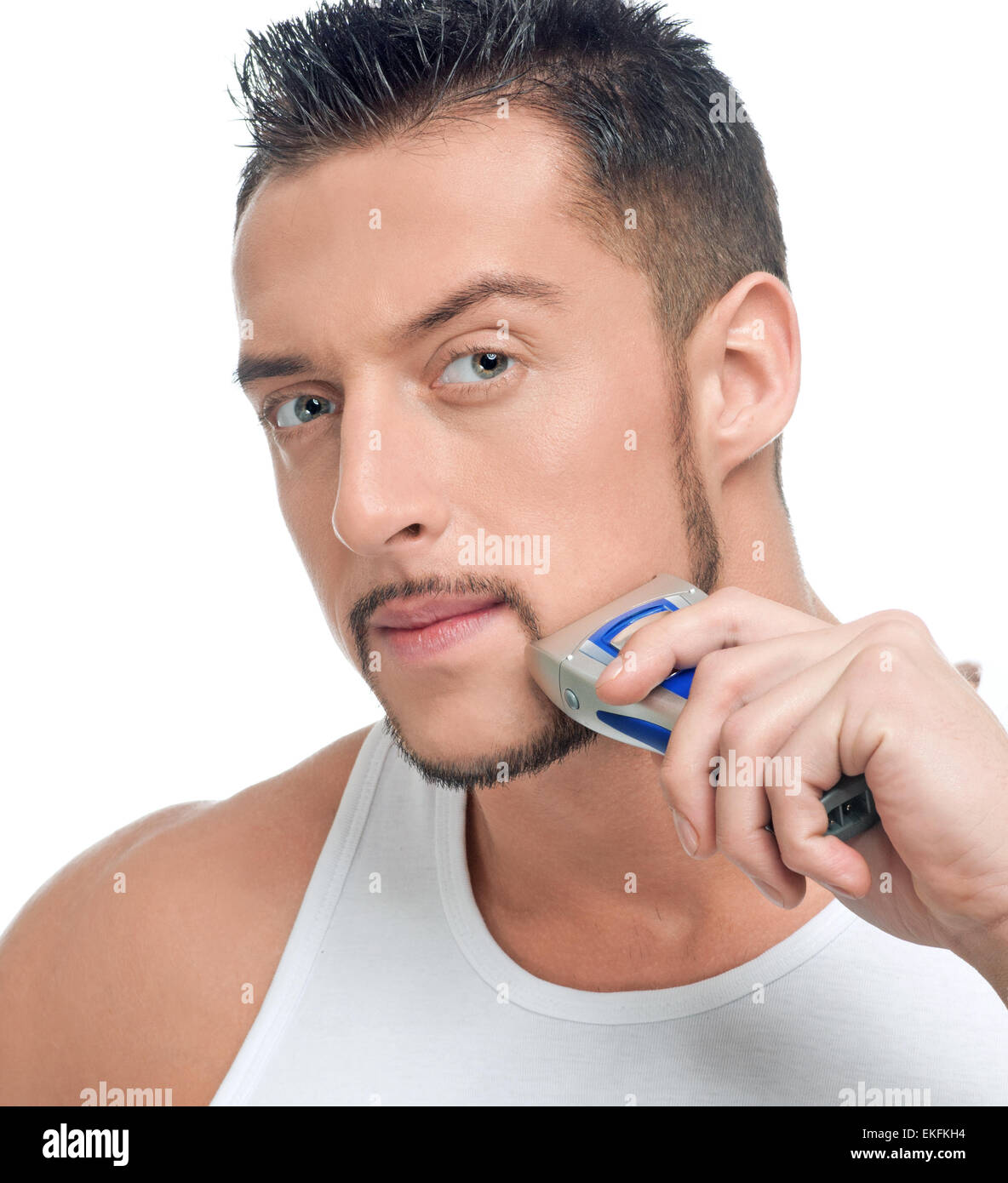Young handsome man shaving Stock Photo - Alamy