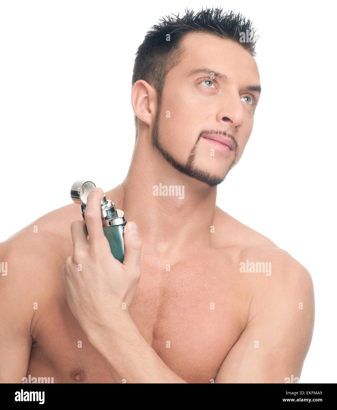 Young handsome man applying perfume Stock Photo - Alamy