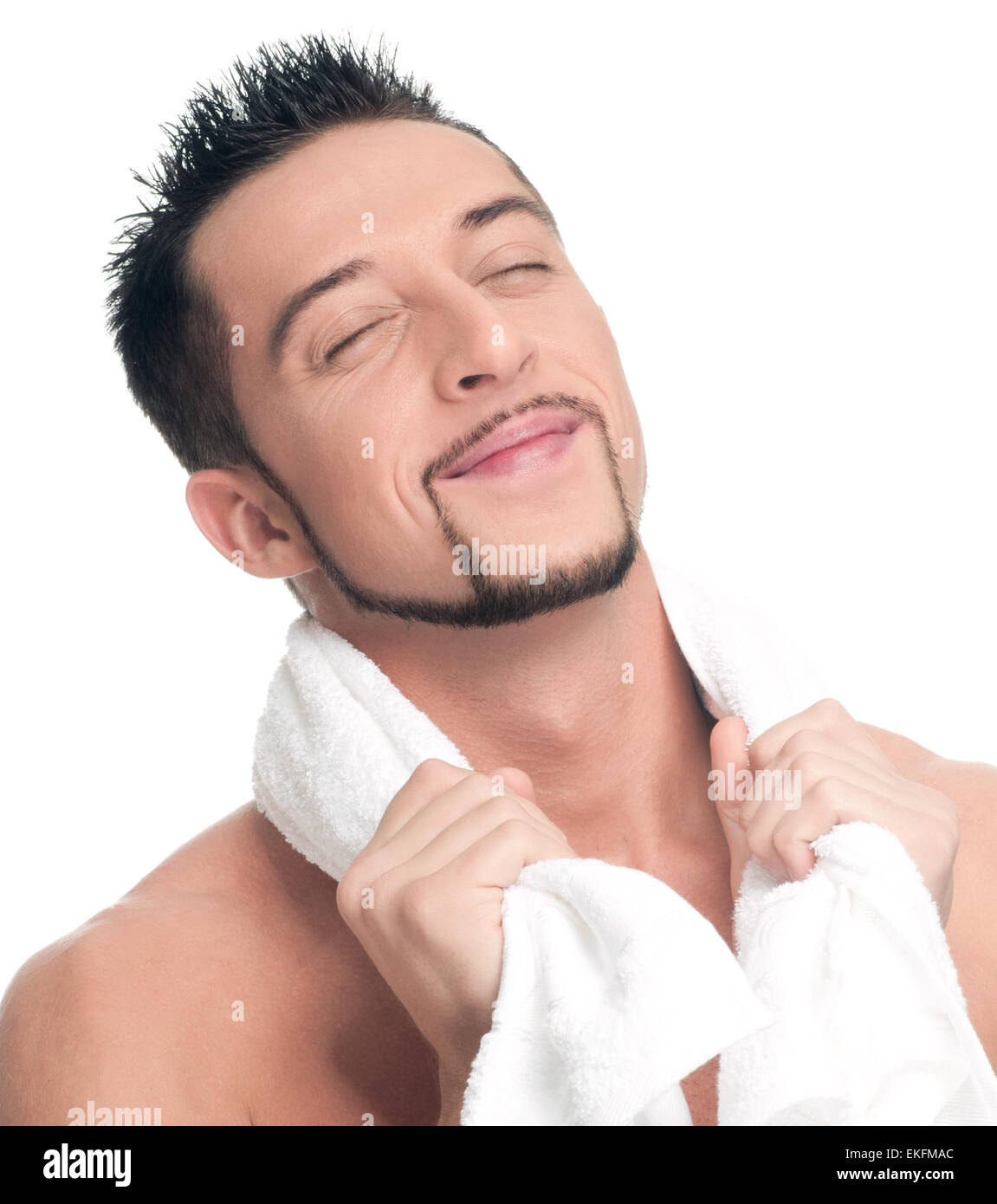 Young man with white towel. SPA. Isolated Stock Photo - Alamy