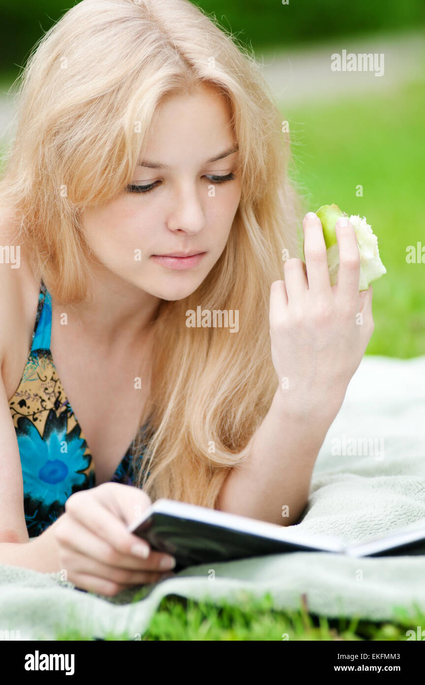 Beautiful young woman read book Stock Photo - Alamy