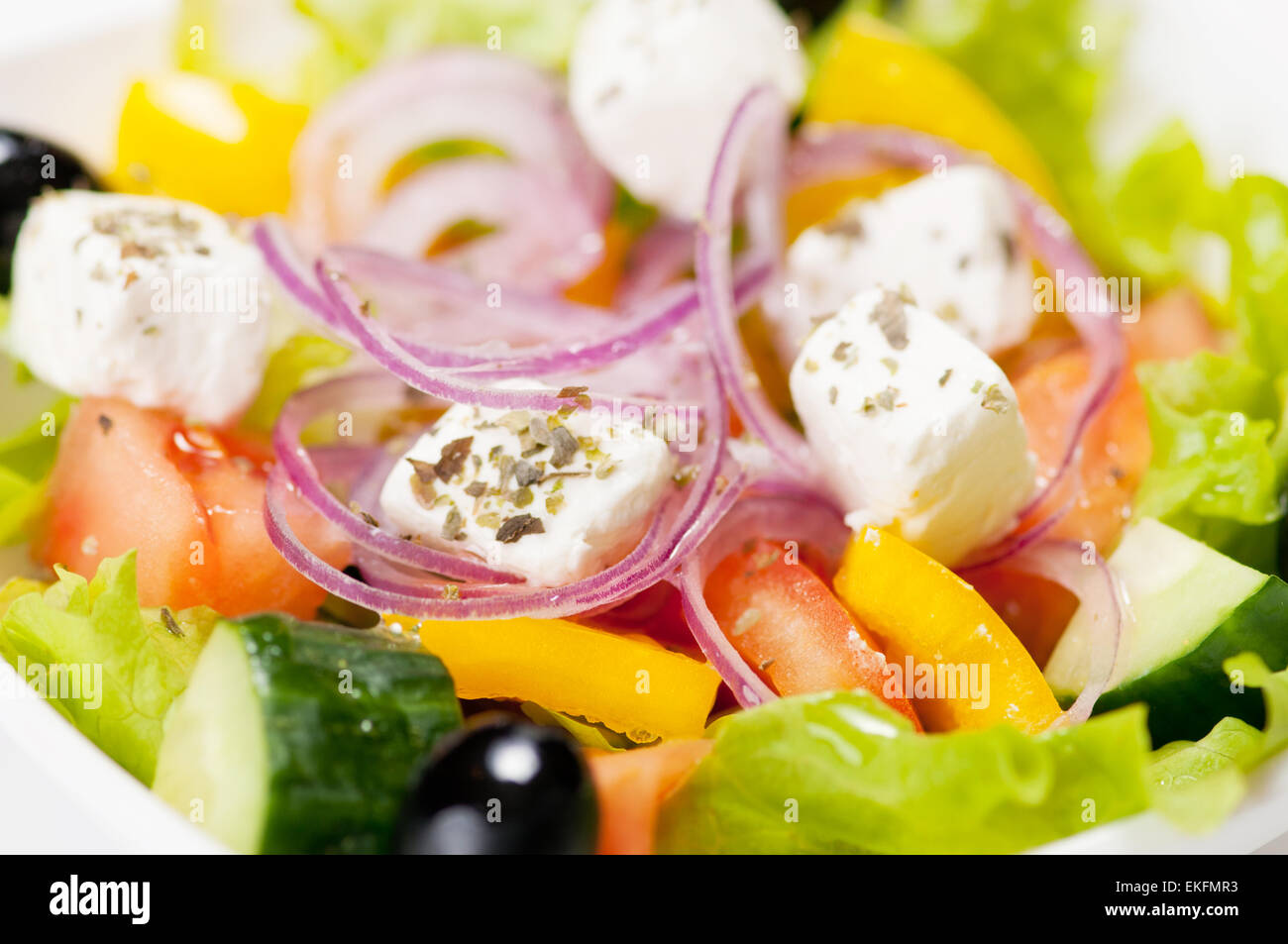 Greek salad on the white background Stock Photo - Alamy