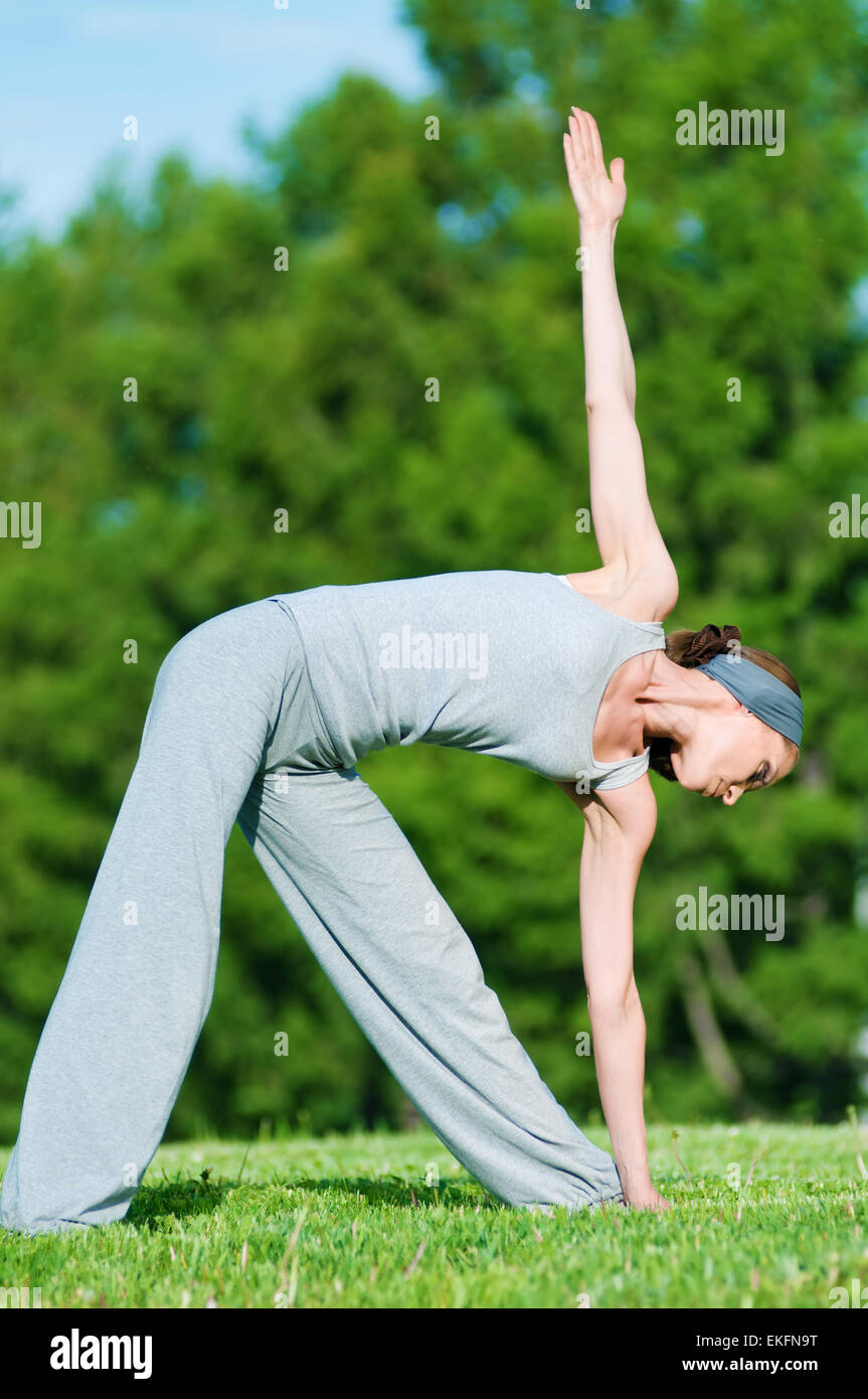 Beautiful woman doing stretching exercise Stock Photo - Alamy