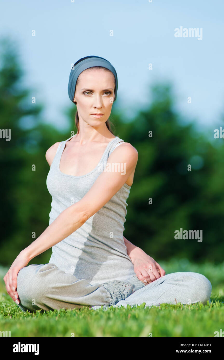 Beautiful woman doing stretching exercise Stock Photo - Alamy