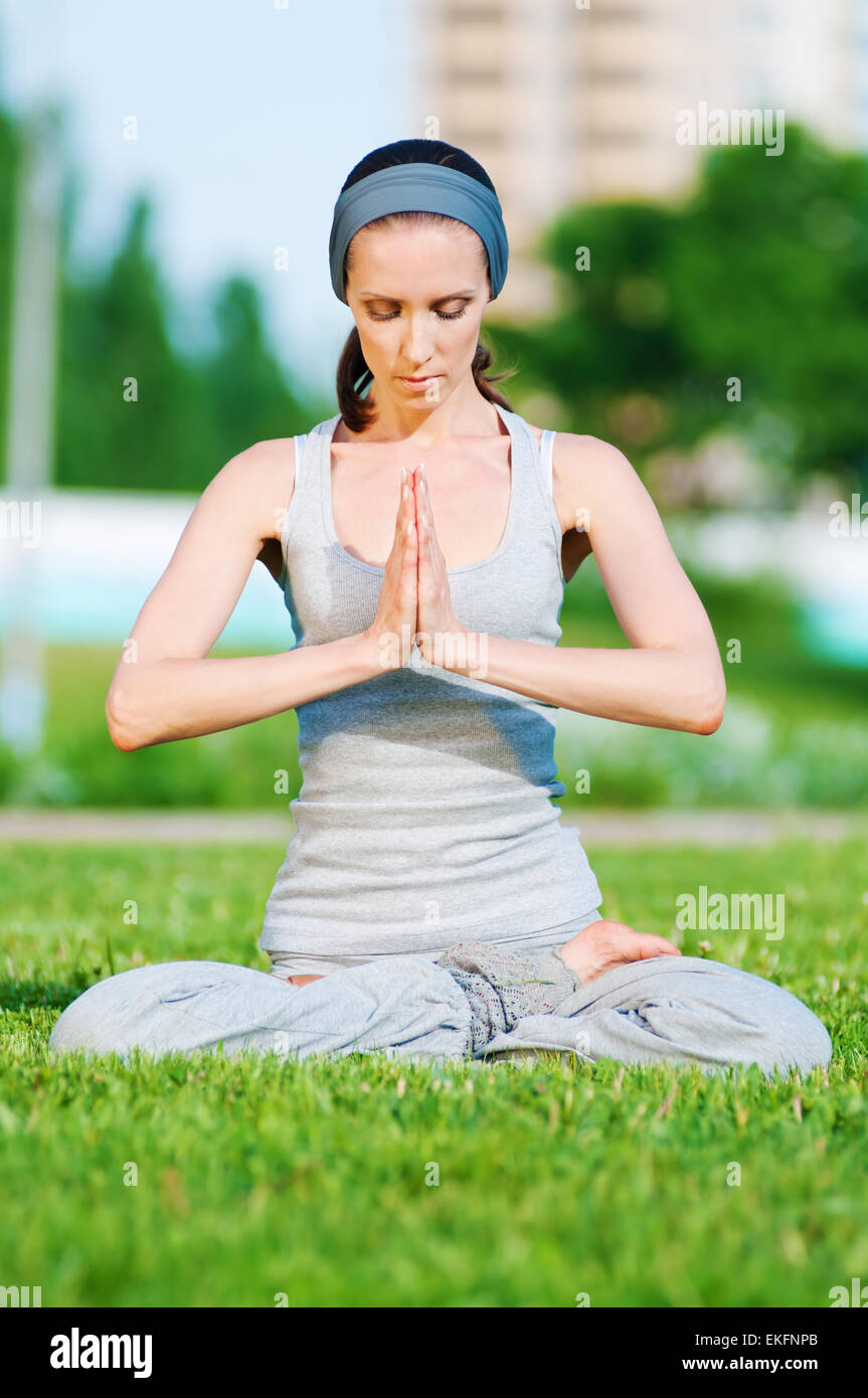 Beautiful woman doing stretching exercise Stock Photo - Alamy