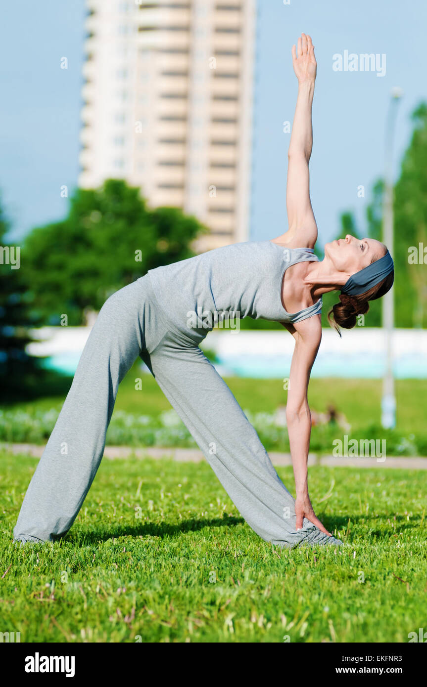 Beautiful woman doing stretching exercise Stock Photo - Alamy