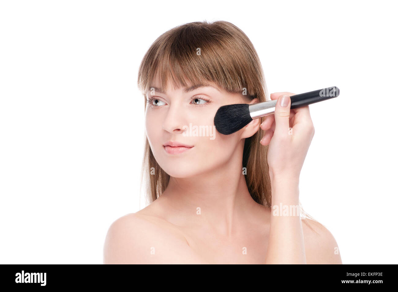 Beautiful woman with make up brush Stock Photo - Alamy