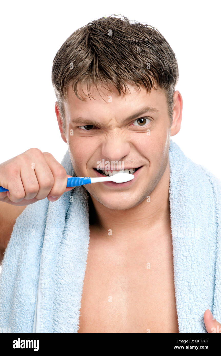 Young man brushing teeth Stock Photo - Alamy