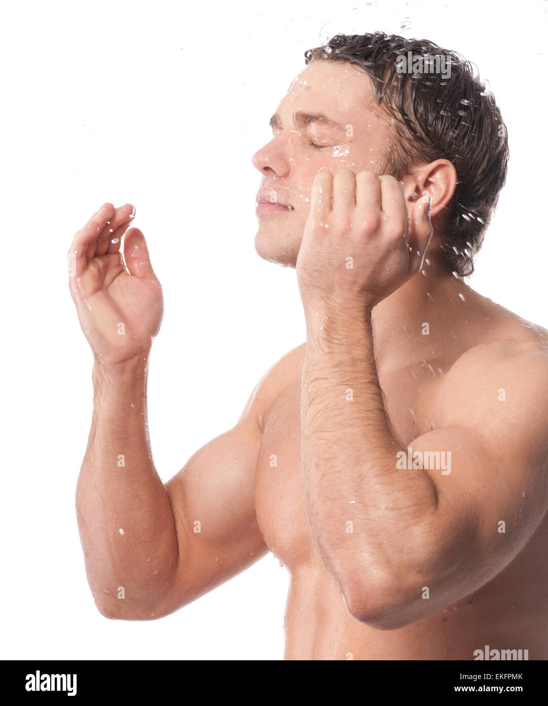 Young man wash face Stock Photo - Alamy
