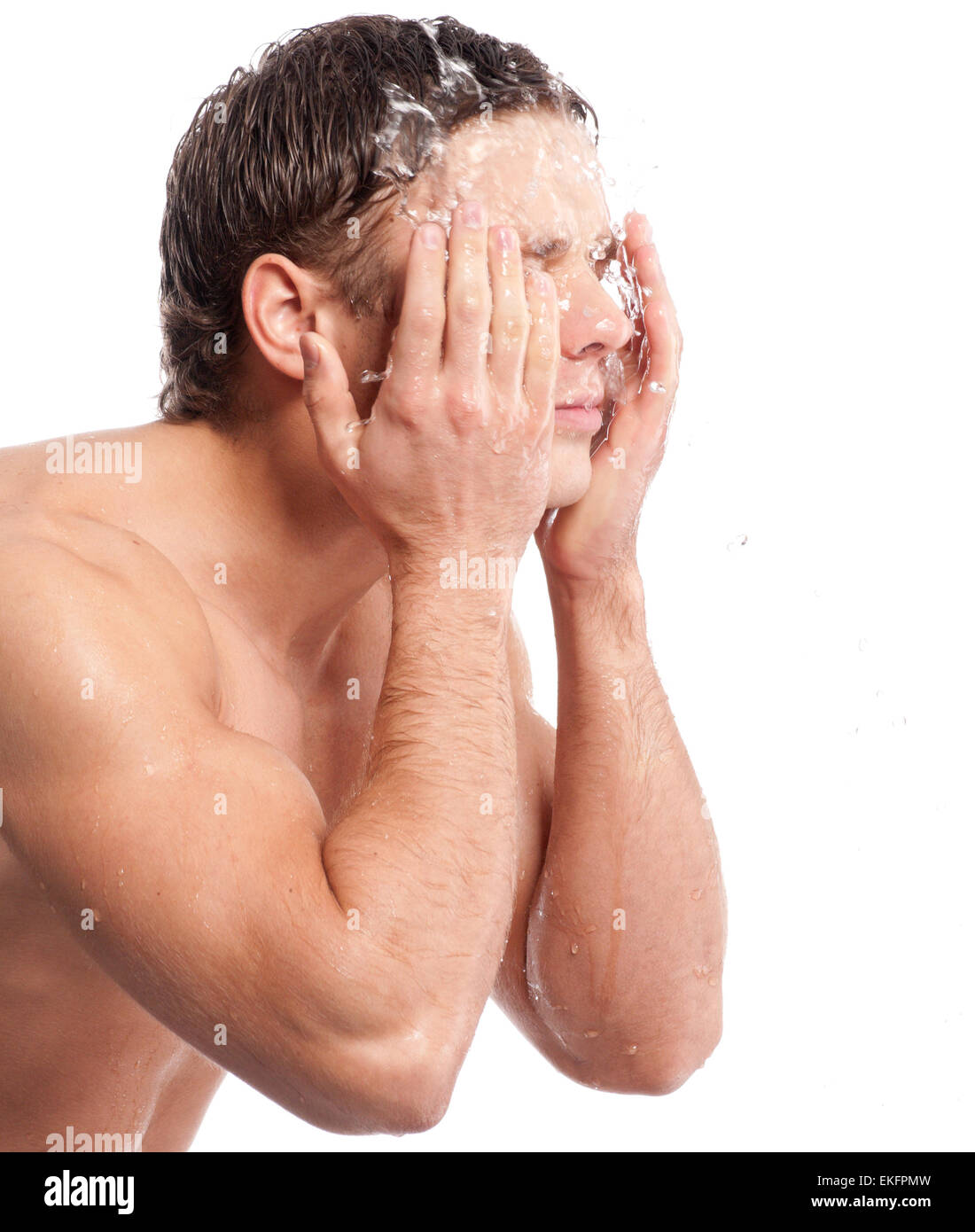 Young man wash face Stock Photo - Alamy