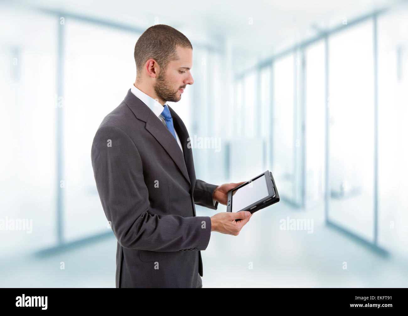 businessman using touch pad of tablet pc, at the office Stock Photo - Alamy