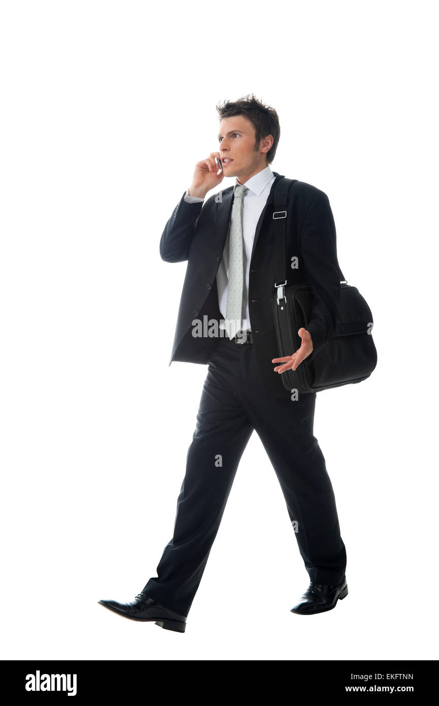 Businessman walking work talking Cut Out Stock Images & Pictures - Alamy