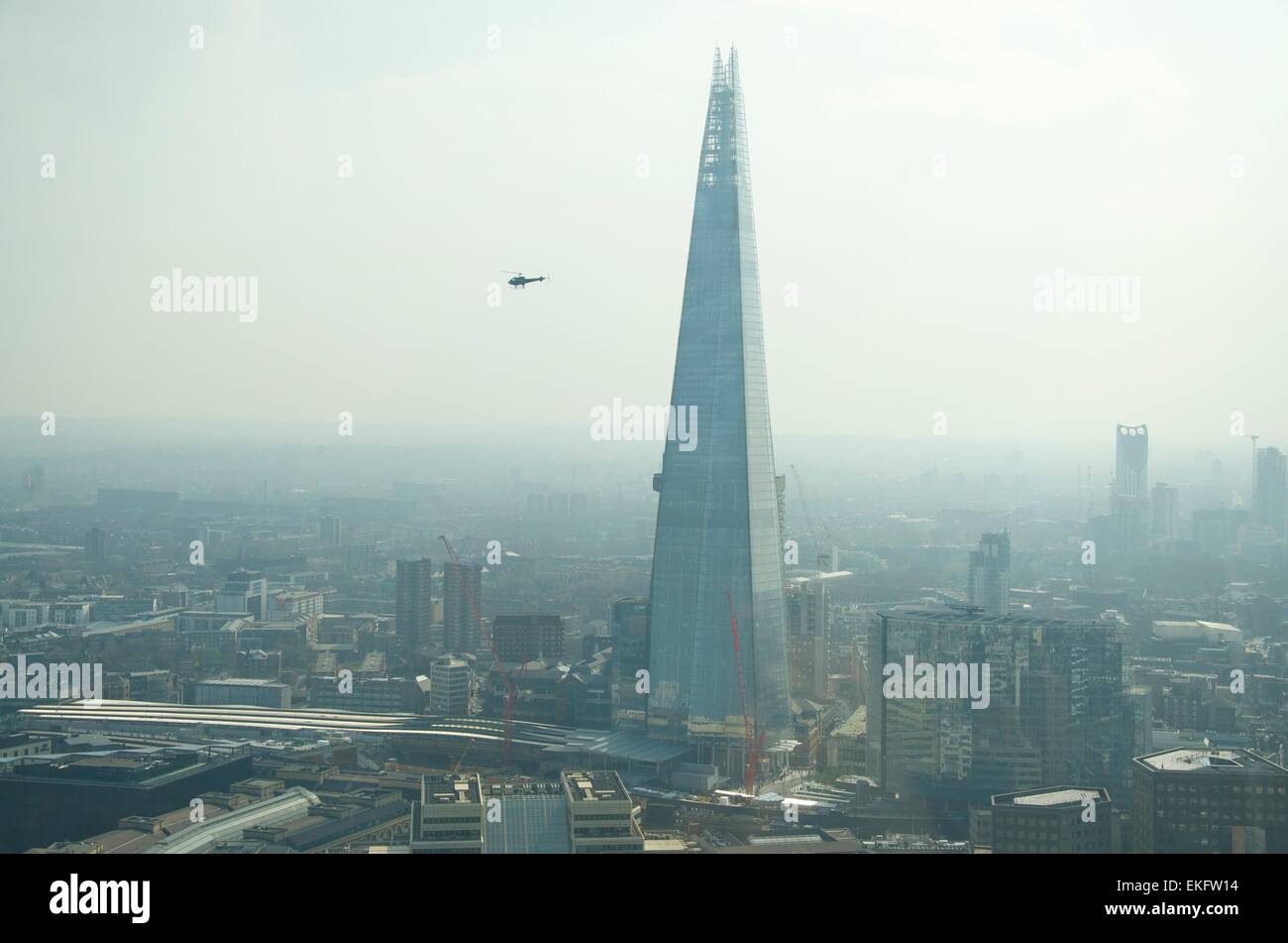 View of The Shard with a helicopter passing it, from the Sky Garden at ...