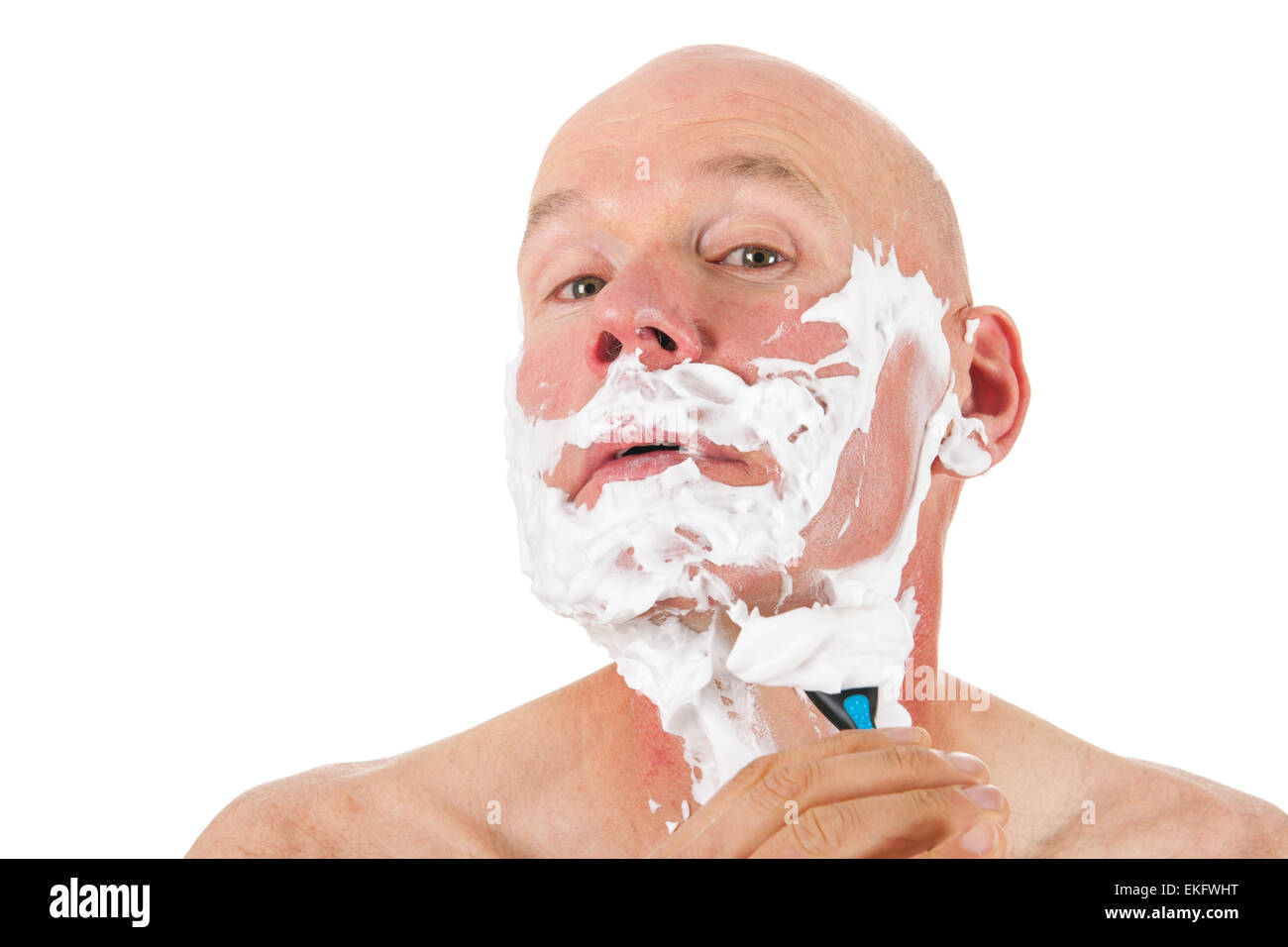 Shaving bald man Stock Photo - Alamy